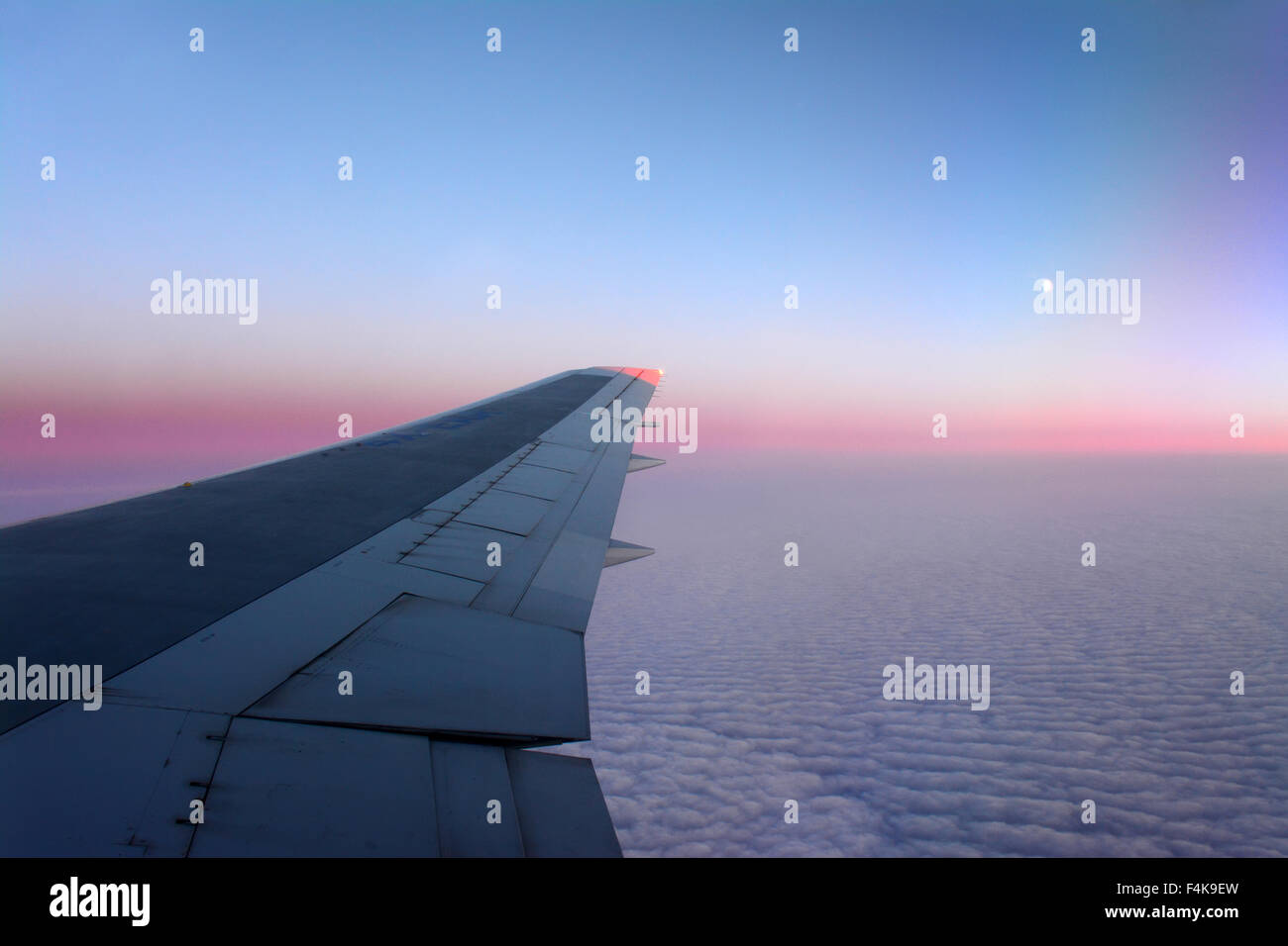 Clouds and sunset by an airplane hi-res stock photography and images ...