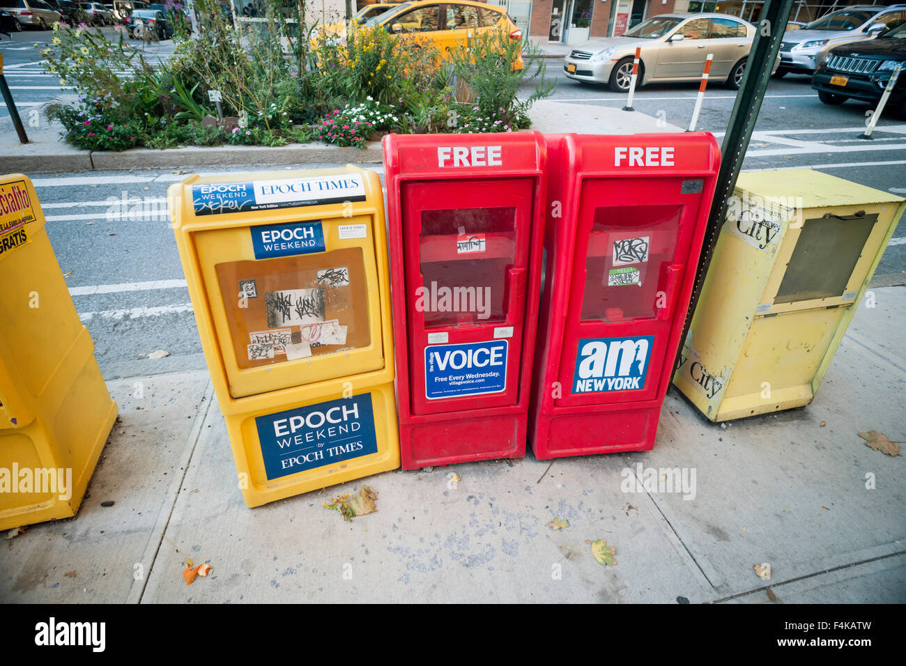 A Village Voice distribution box is seen with other newspaper boxes in ...