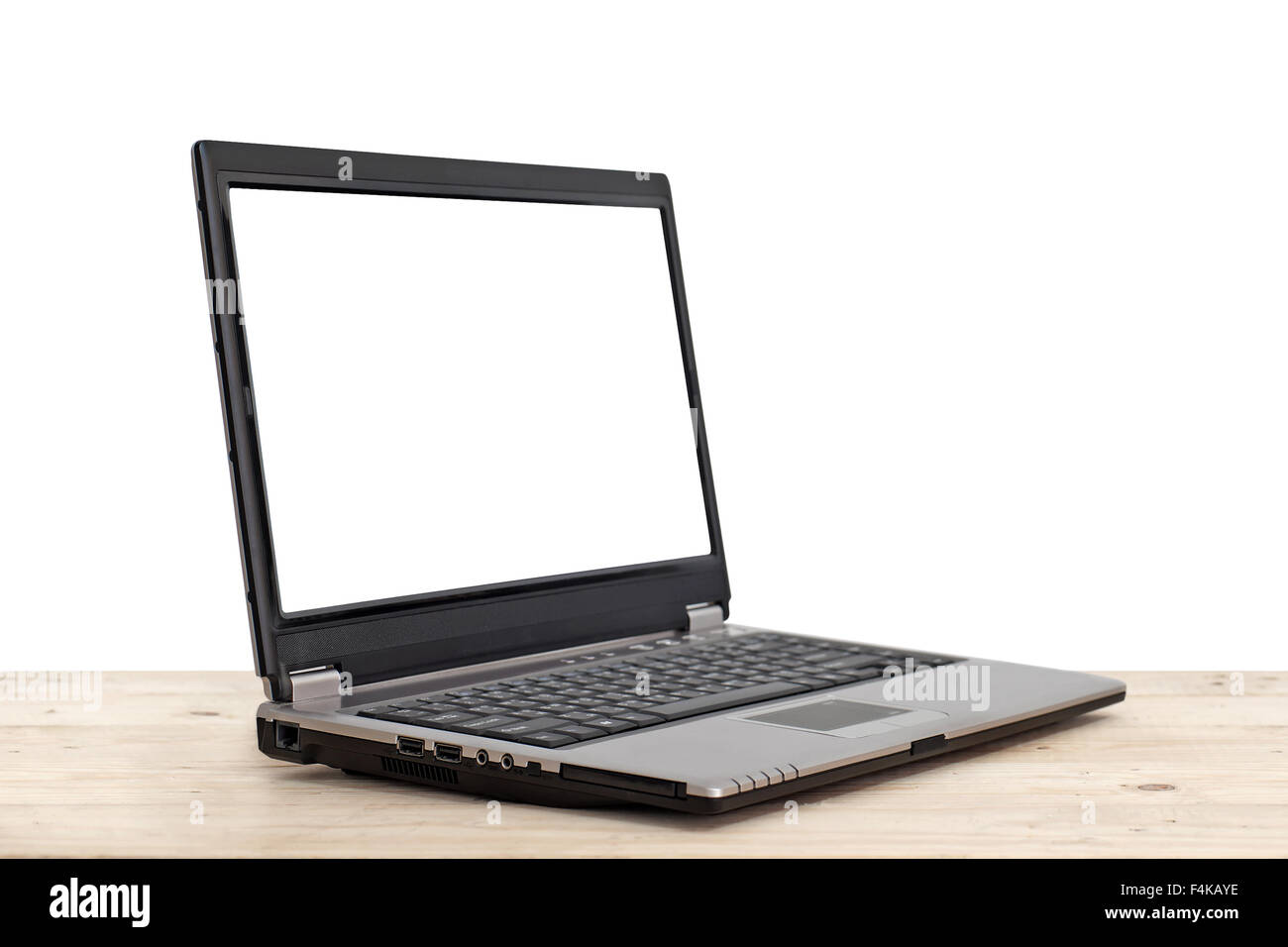 laptop with blank screen on wooden table isolated on white background ...