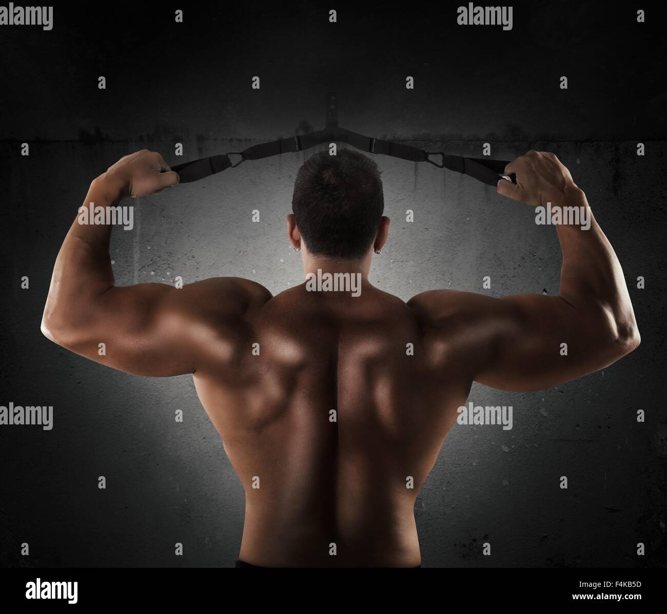 Shoulder muscles with trx Stock Photo - Alamy