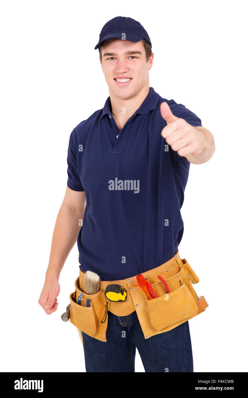 portrait of handsome young handyman giving thumb up Stock Photo - Alamy