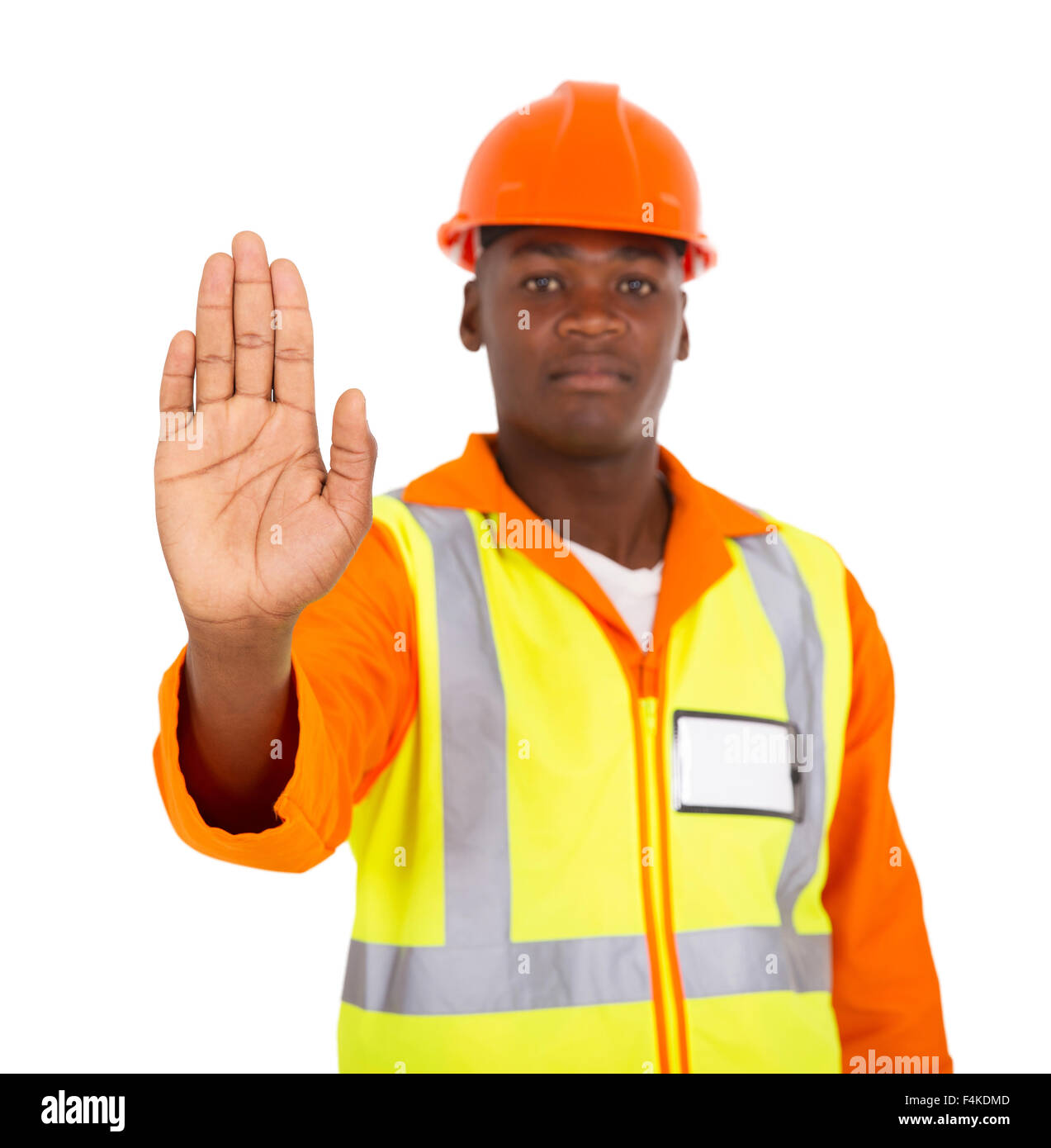 African constructor showing stop gesture on white background Stock ...