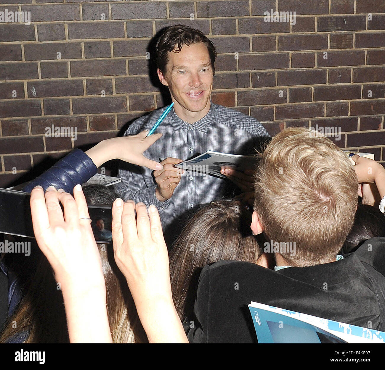 Benedict Cumberbatch is greeted by hundreds of screaming fans, as he ...