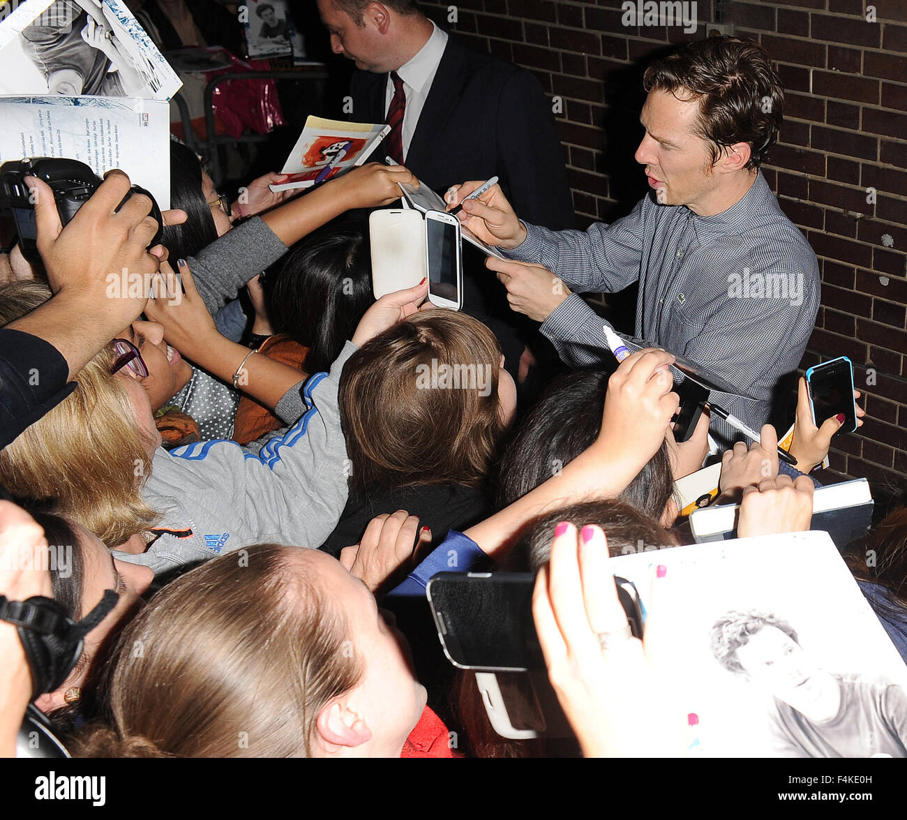 Benedict Cumberbatch is greeted by hundreds of screaming fans, as he ...