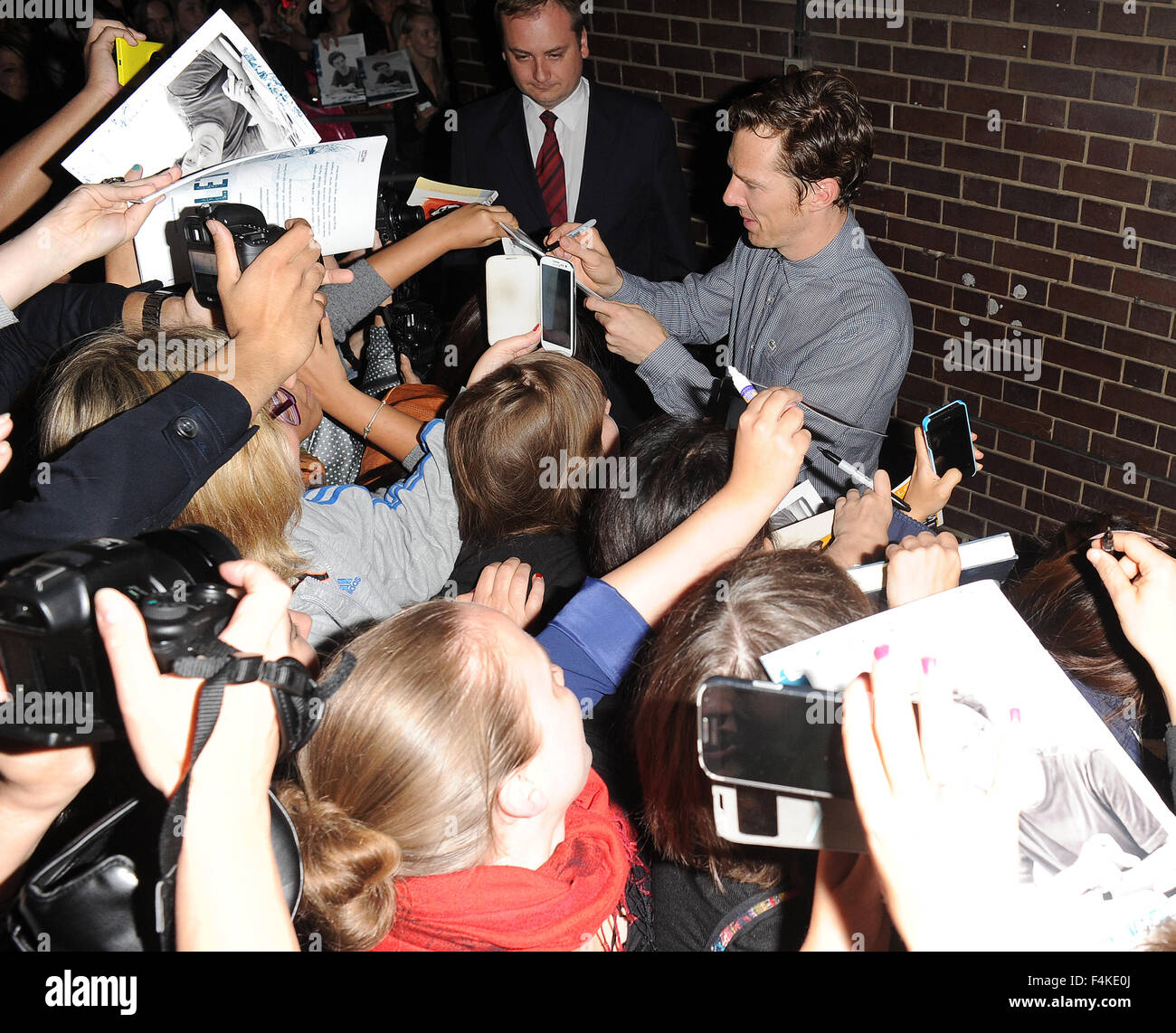Benedict Cumberbatch is greeted by hundreds of screaming fans, as he ...