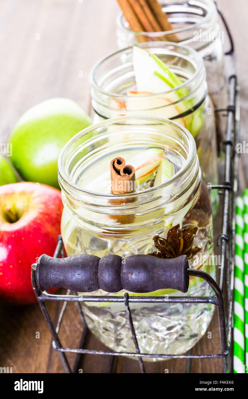 Infused apple water with cinnamon and anise Stock Photo - Alamy