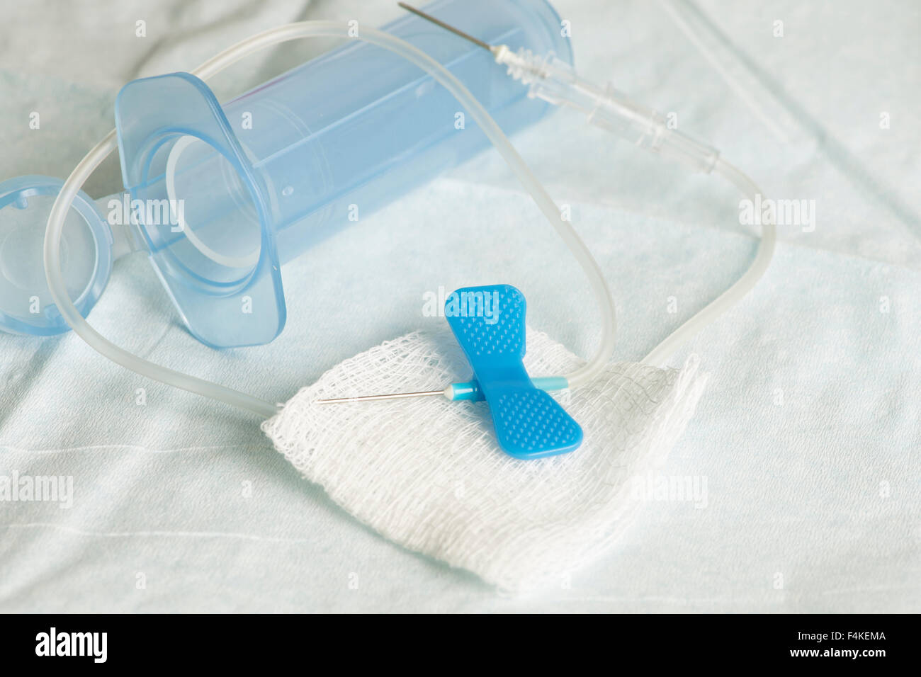 Butterfly catheter with blood sample collection tube holder and ...