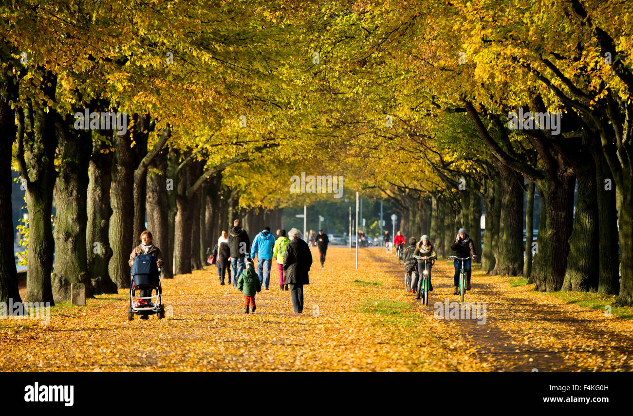 Hanover, Germany. 19th Oct, 2015. People stroll and cycle along a broad ...
