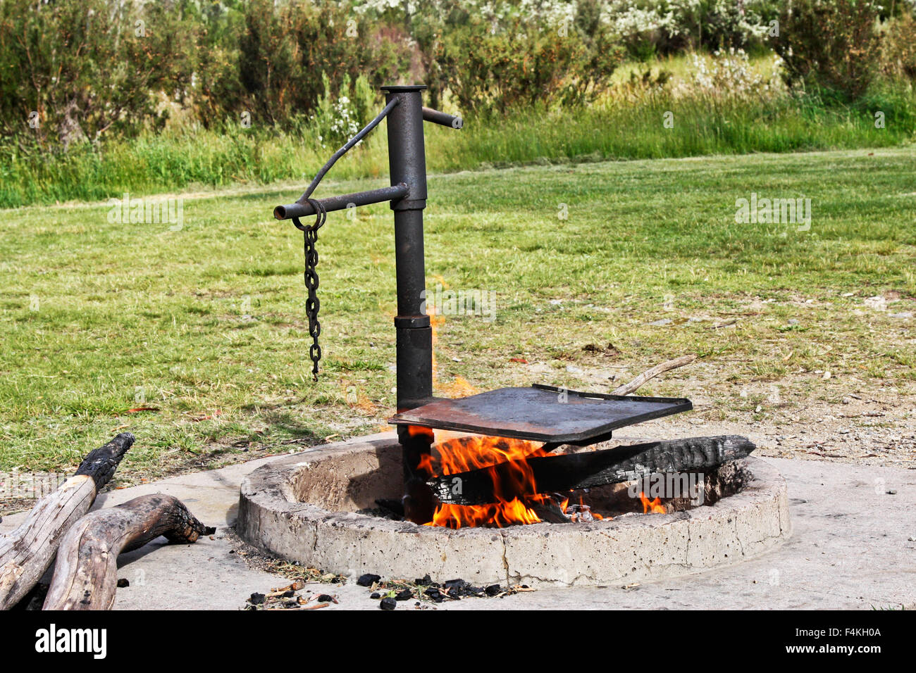 heating up the barbecue ready for cooking dinner Stock Photo - Alamy