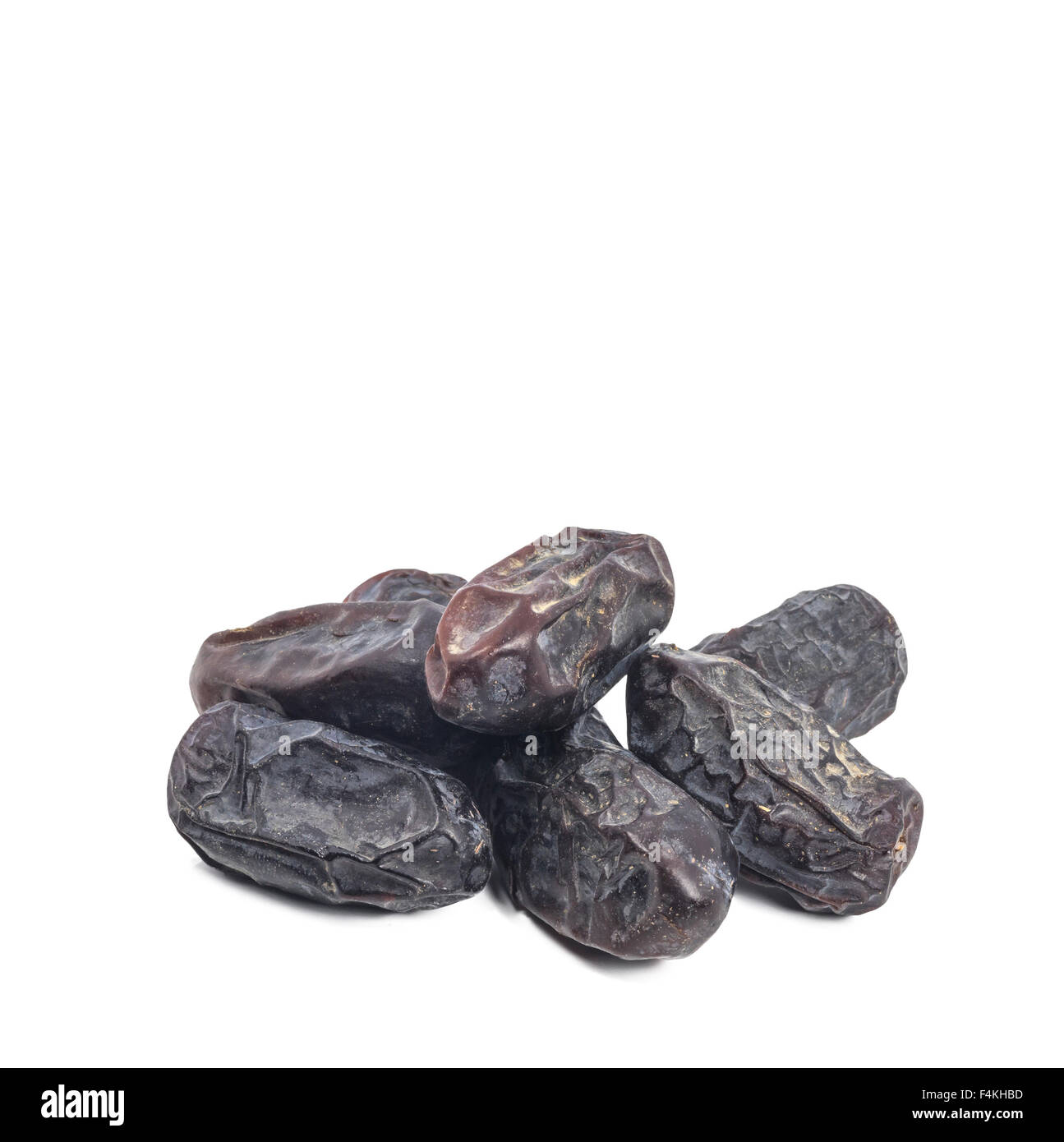 A stack of dry dates with isolated white background Stock Photo - Alamy
