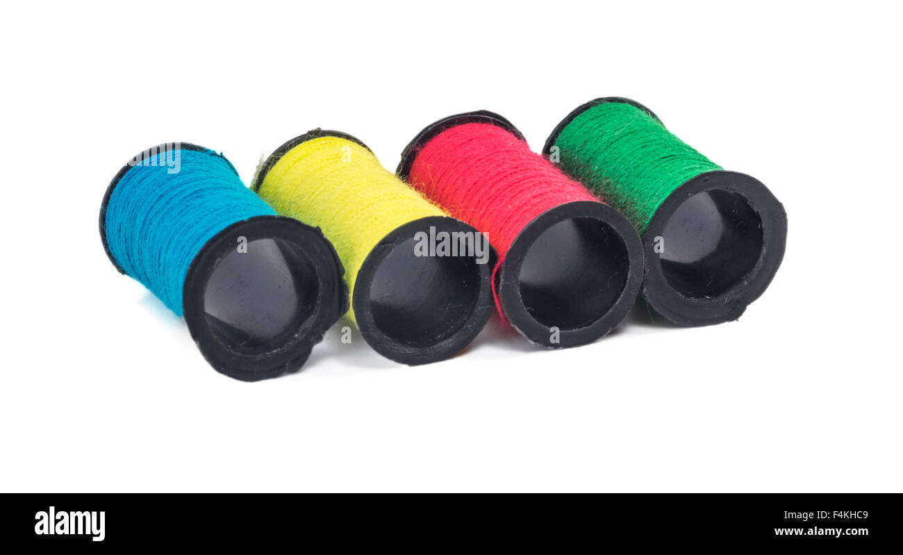 Multi color sewing thread with isolated white background Stock Photo ...