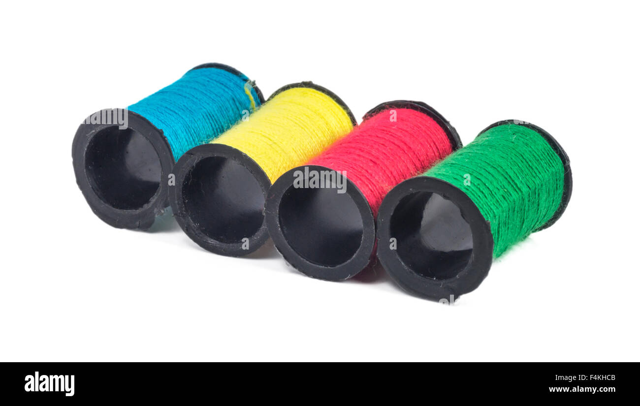 Multi color sewing thread with isolated white background Stock Photo ...