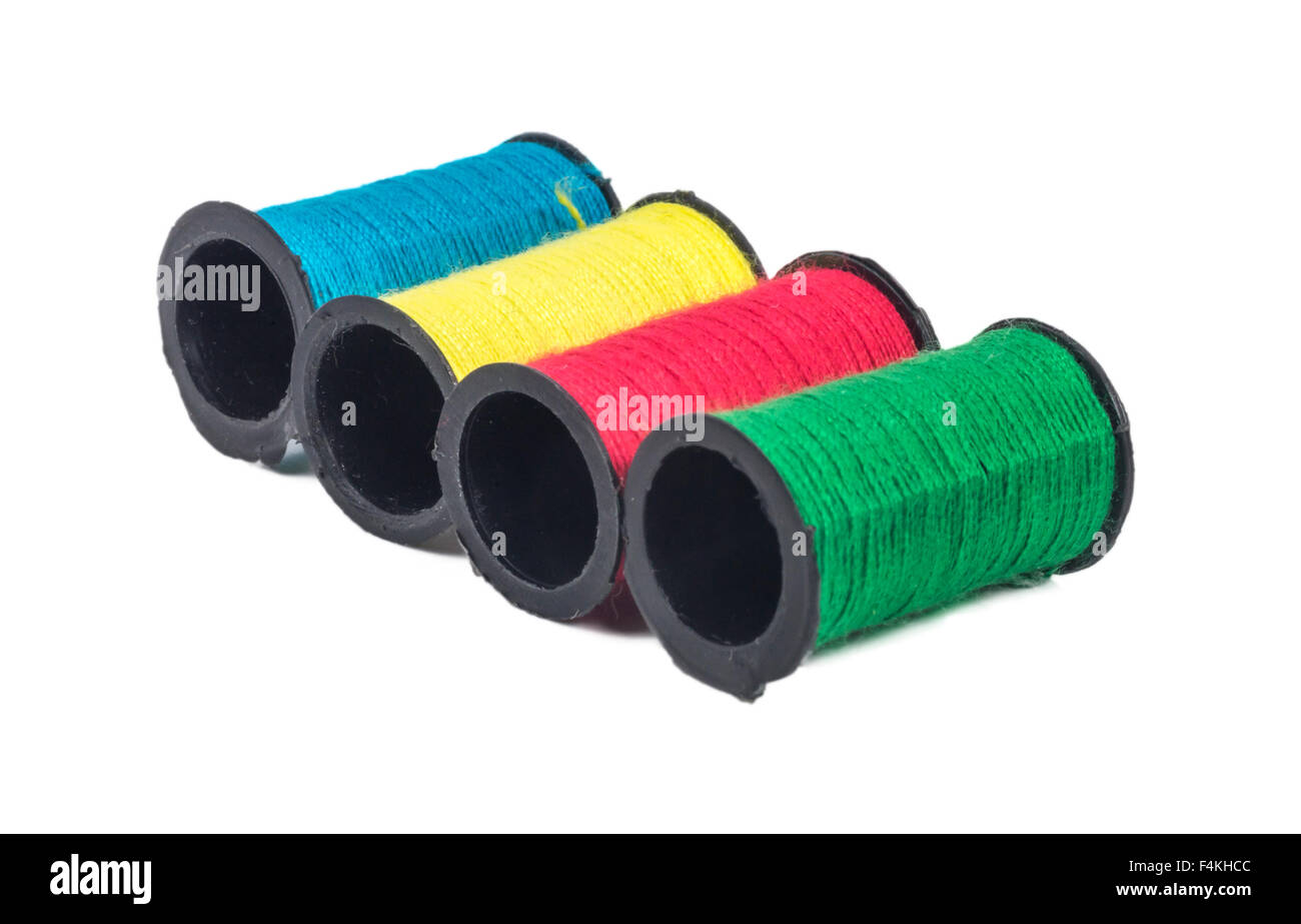 Multi color sewing thread with isolated white background Stock Photo ...