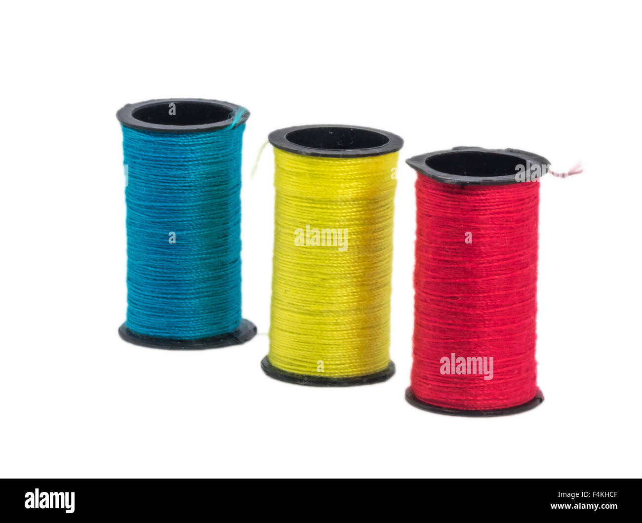 Multi color sewing thread with isolated white background Stock Photo ...