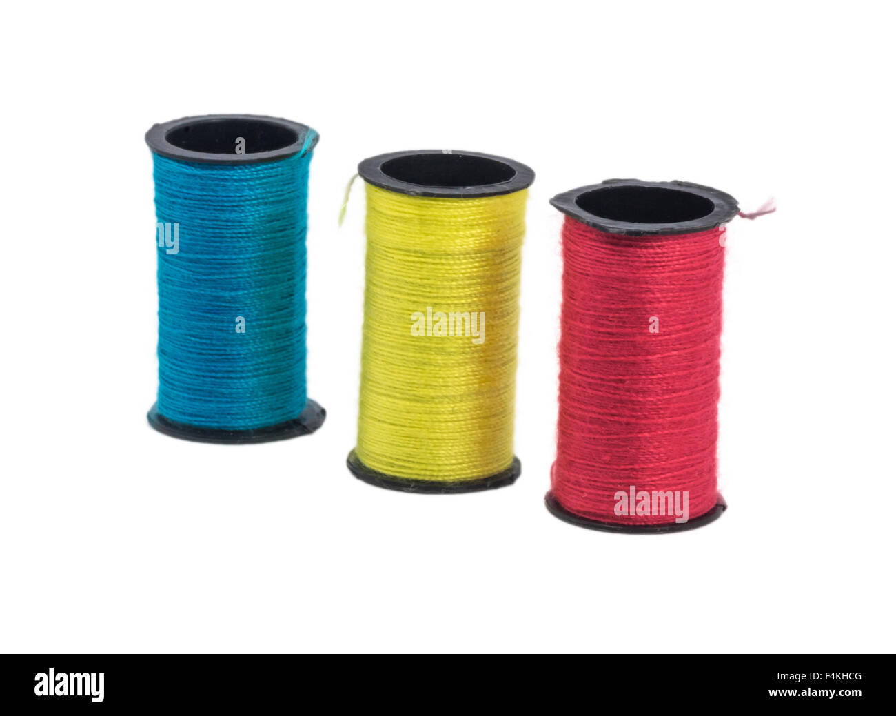 Multicolor sewing threads with isolated white background Stock Photo ...