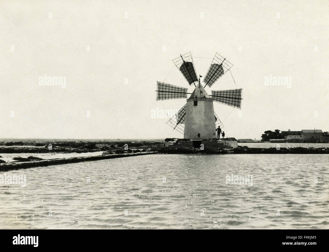 Windmill of the salt of Trapani, Italy Stock Photo - Alamy
