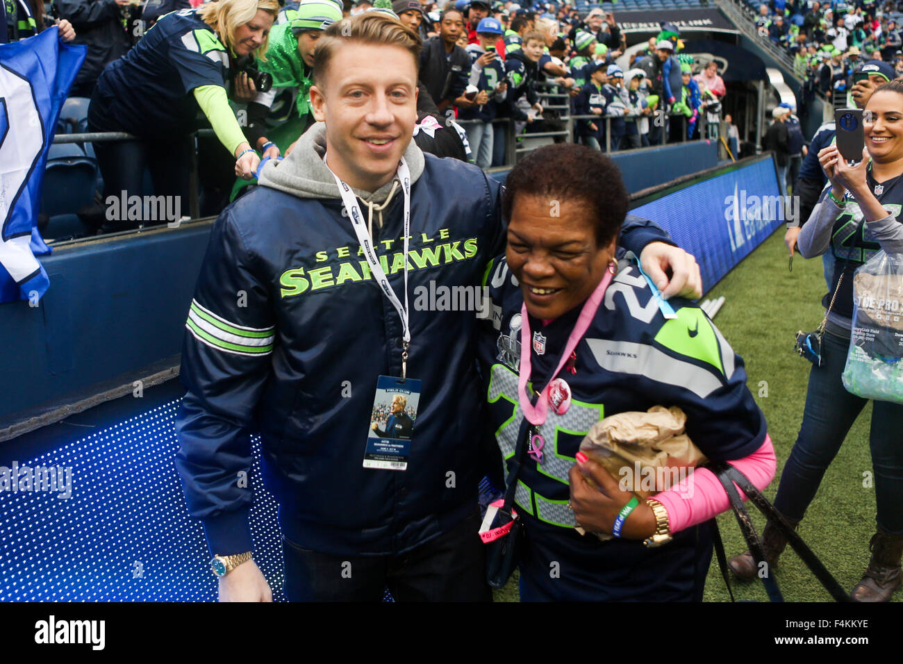 MACKLEMORE visits with fans before the game. The Seattle Seahawks ...