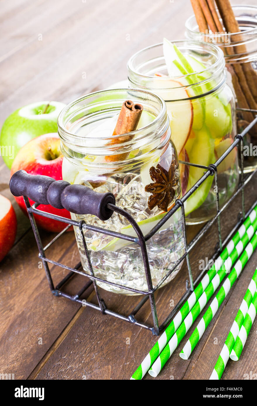 Infused apple water with cinnamon and anise Stock Photo - Alamy