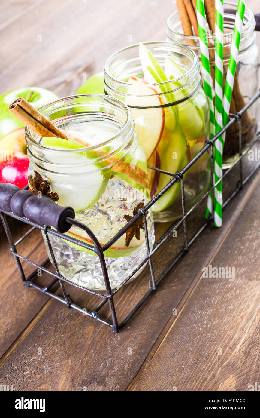 Infused apple water with cinnamon and anise Stock Photo - Alamy