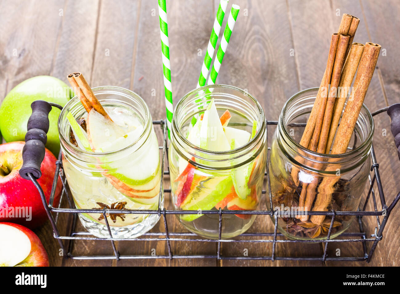 Infused apple water with cinnamon and anise Stock Photo - Alamy