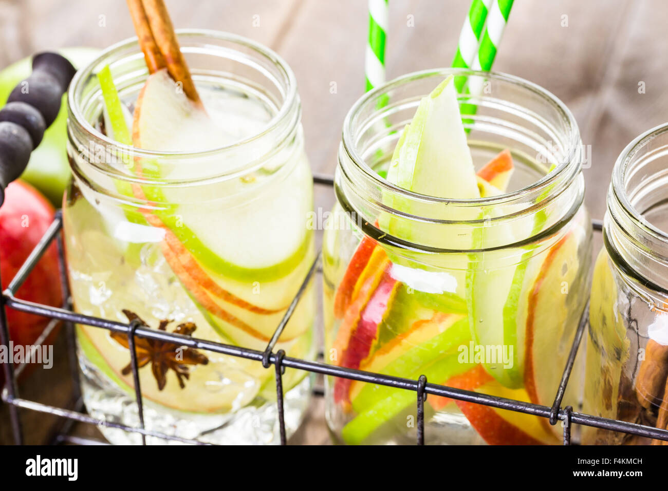 Infused apple water with cinnamon and anise Stock Photo - Alamy