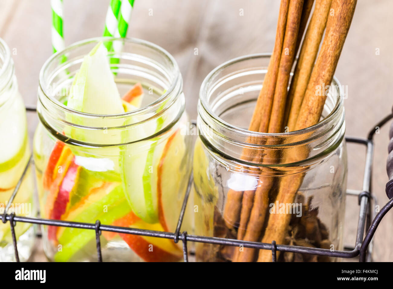 Infused apple water with cinnamon and anise Stock Photo - Alamy