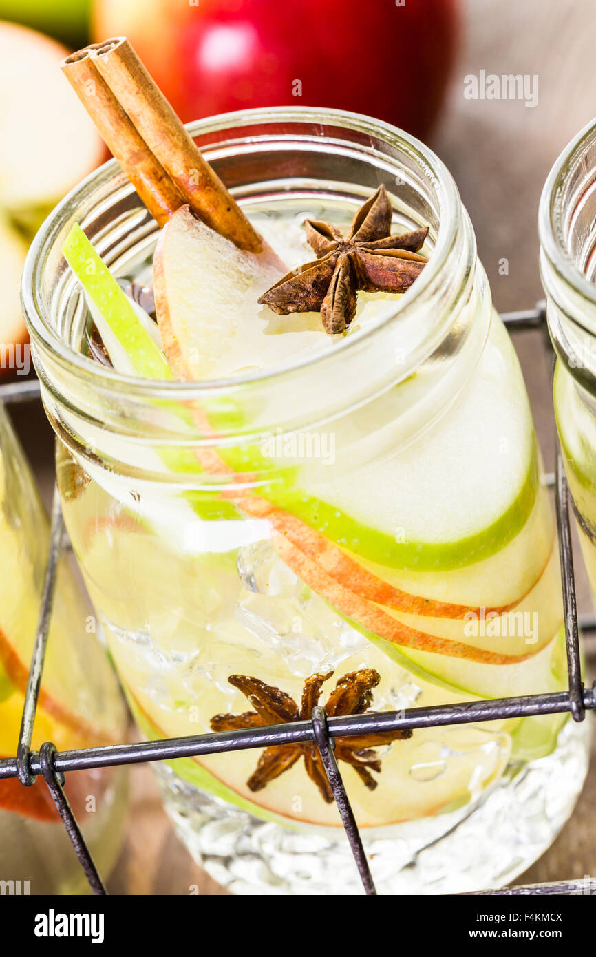 Infused apple water with cinnamon and anise Stock Photo - Alamy