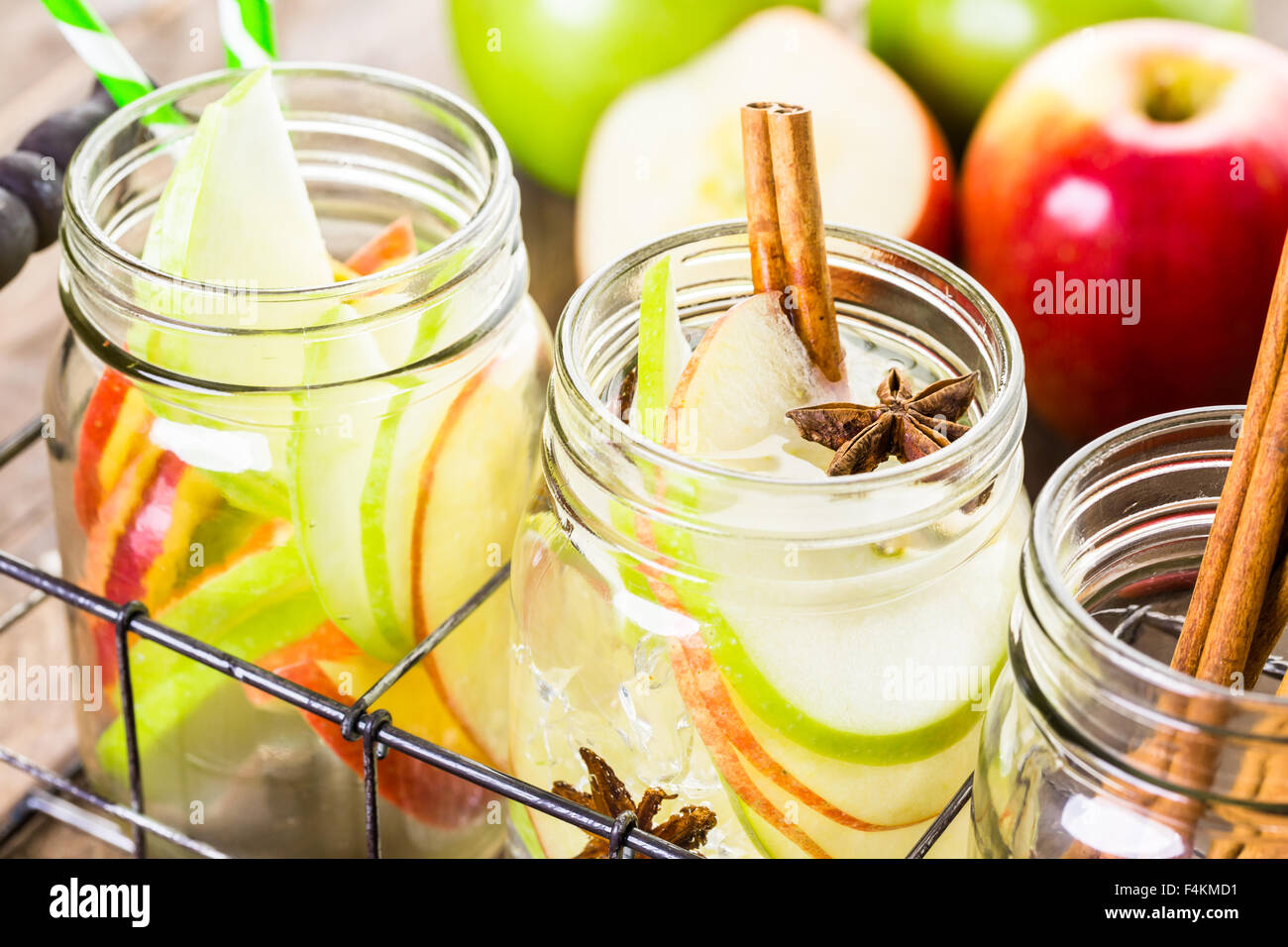 Infused apple water with cinnamon and anise Stock Photo - Alamy