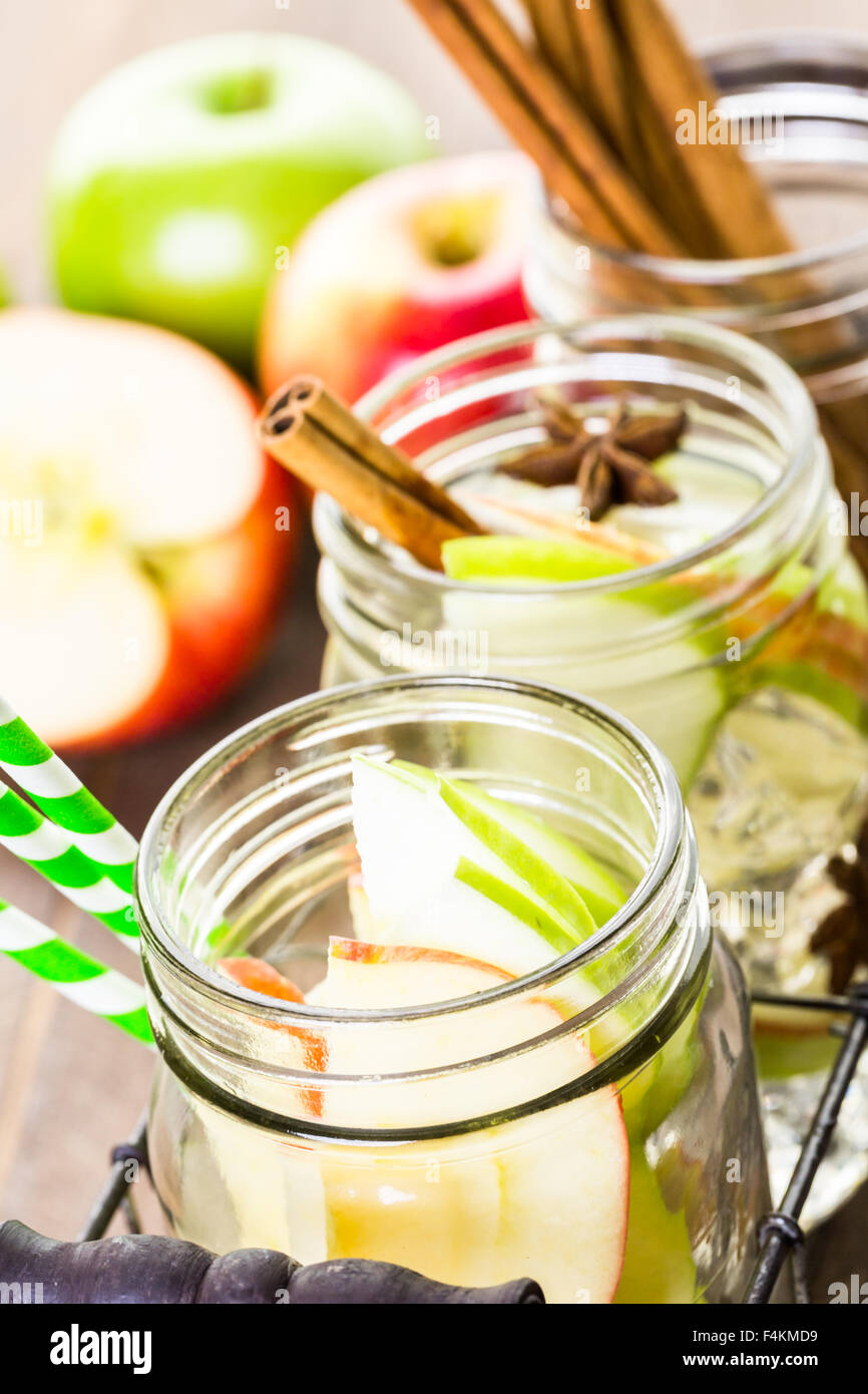 Infused apple water with cinnamon and anise Stock Photo - Alamy