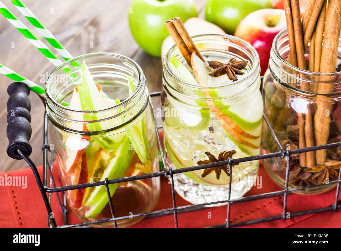 Infused apple water with cinnamon and anise Stock Photo - Alamy