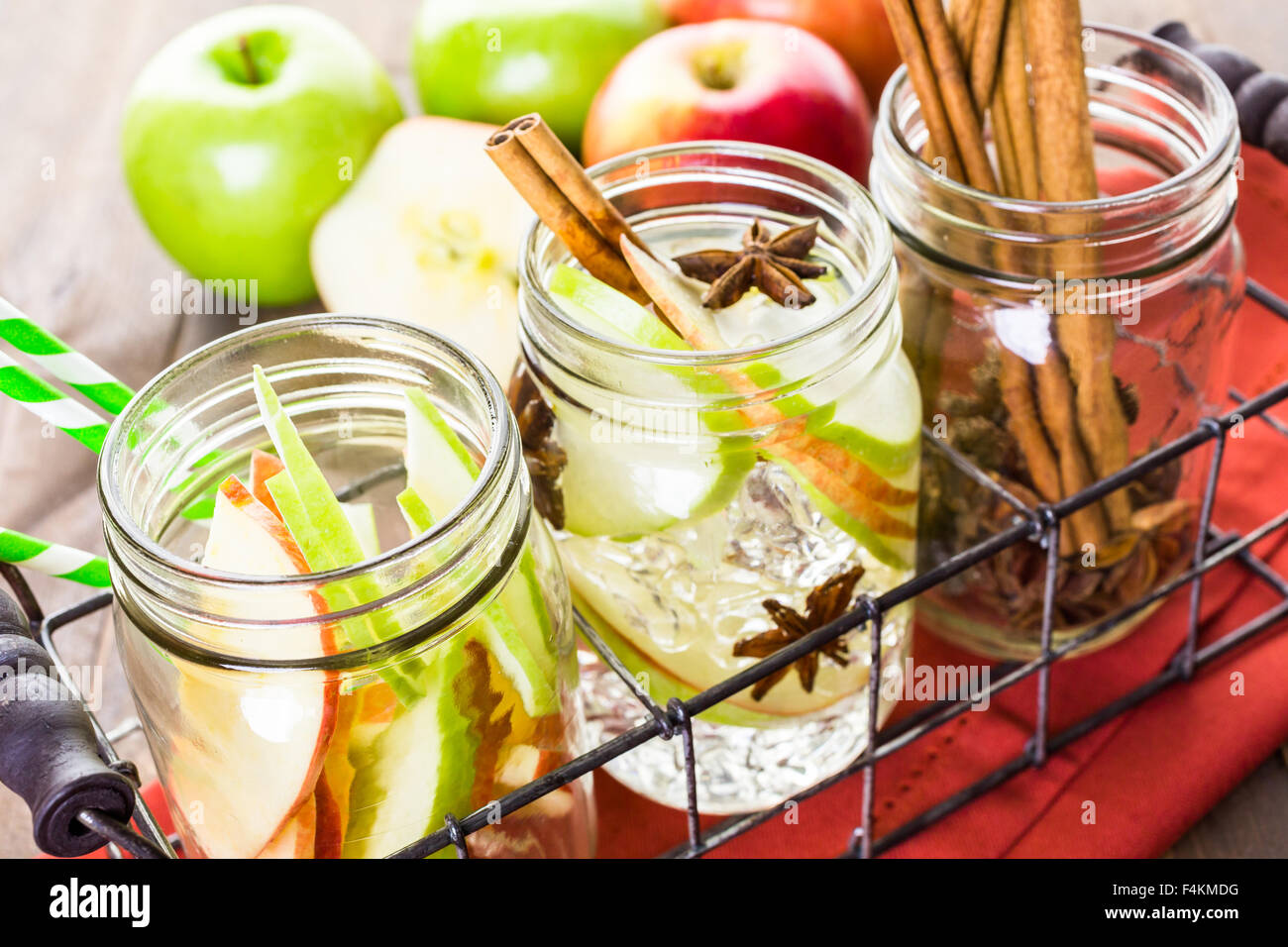 Infused apple water with cinnamon and anise Stock Photo - Alamy