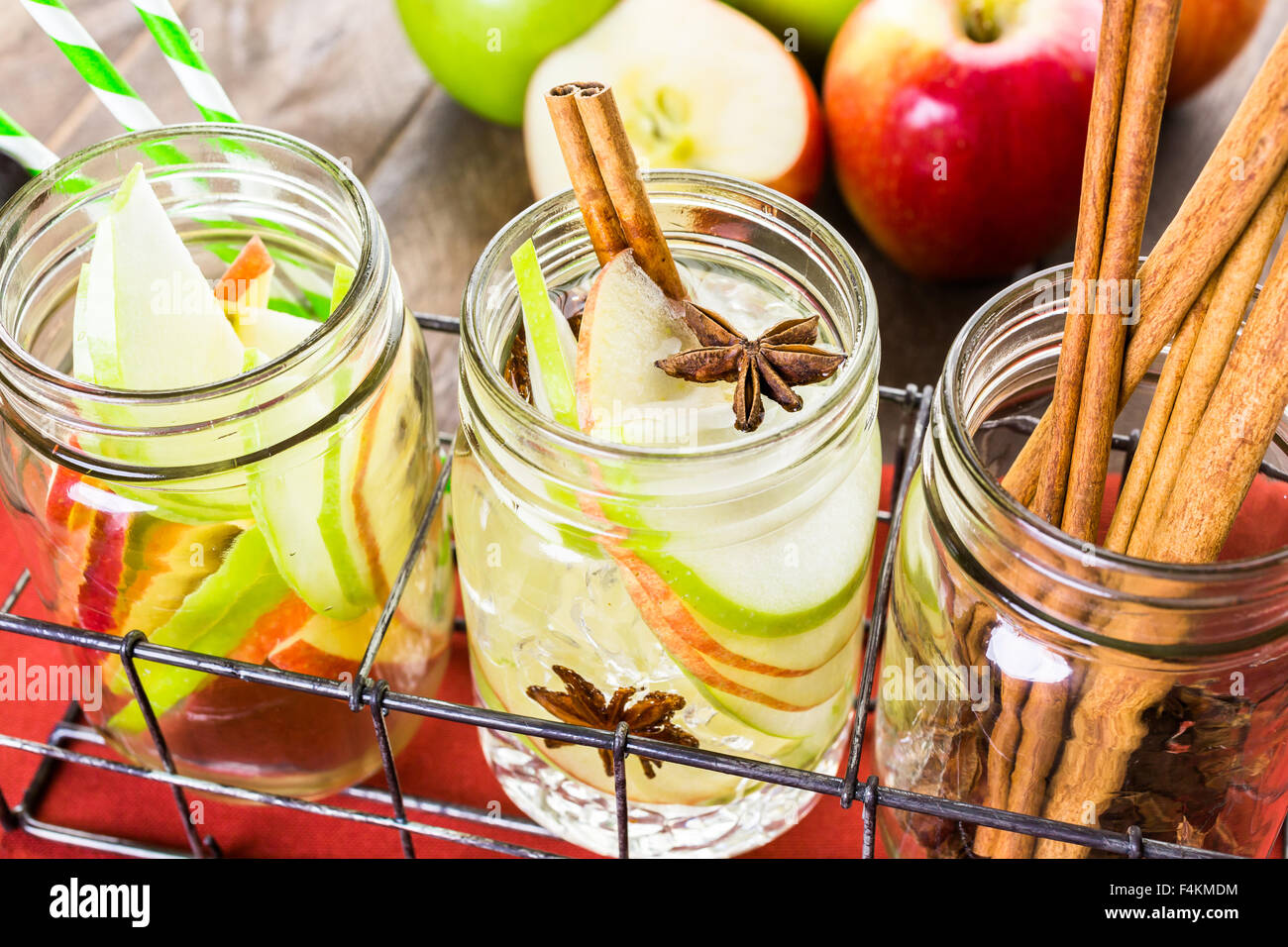 Infused apple water with cinnamon and anise Stock Photo - Alamy