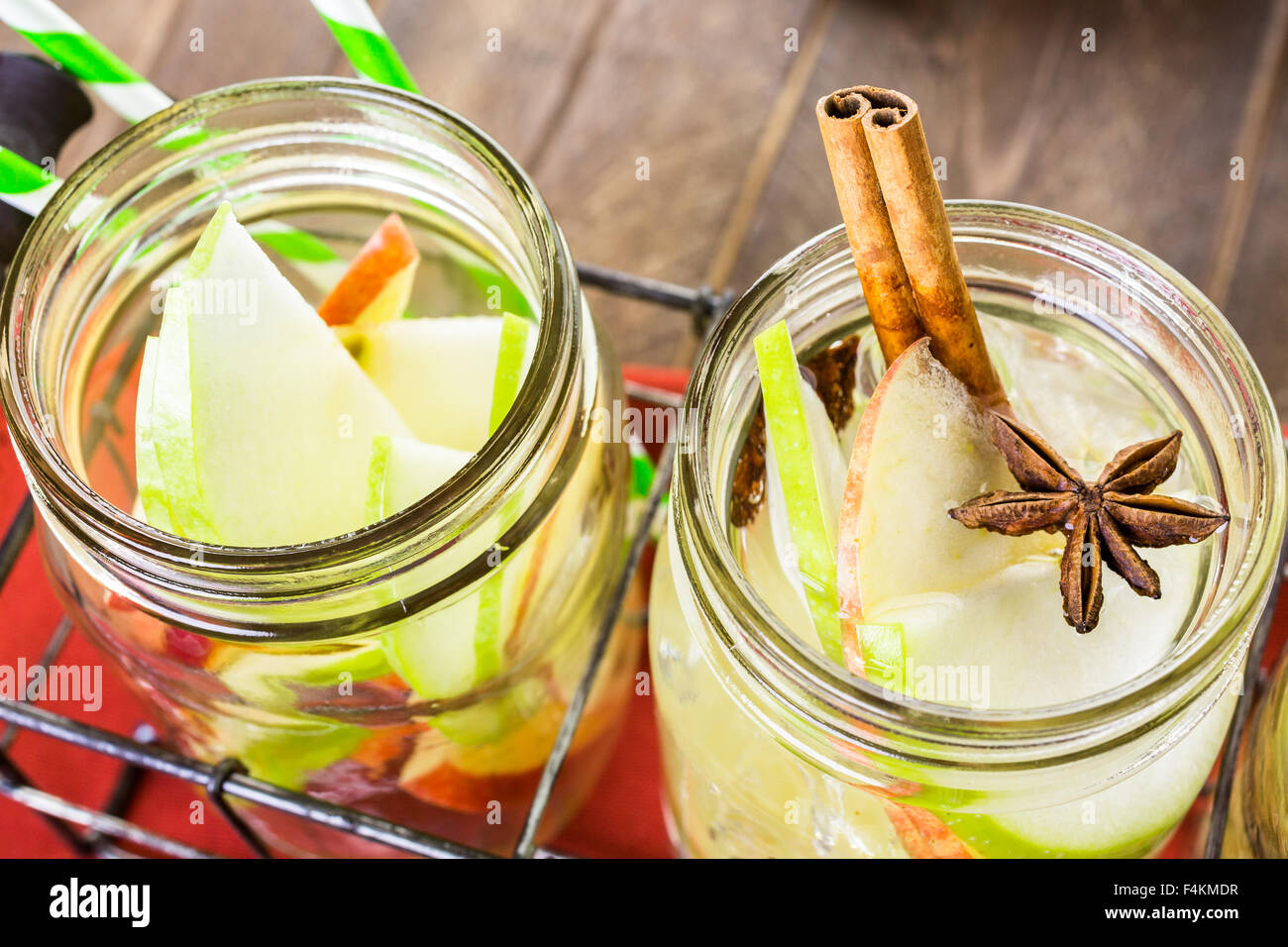 Infused apple water with cinnamon and anise Stock Photo - Alamy