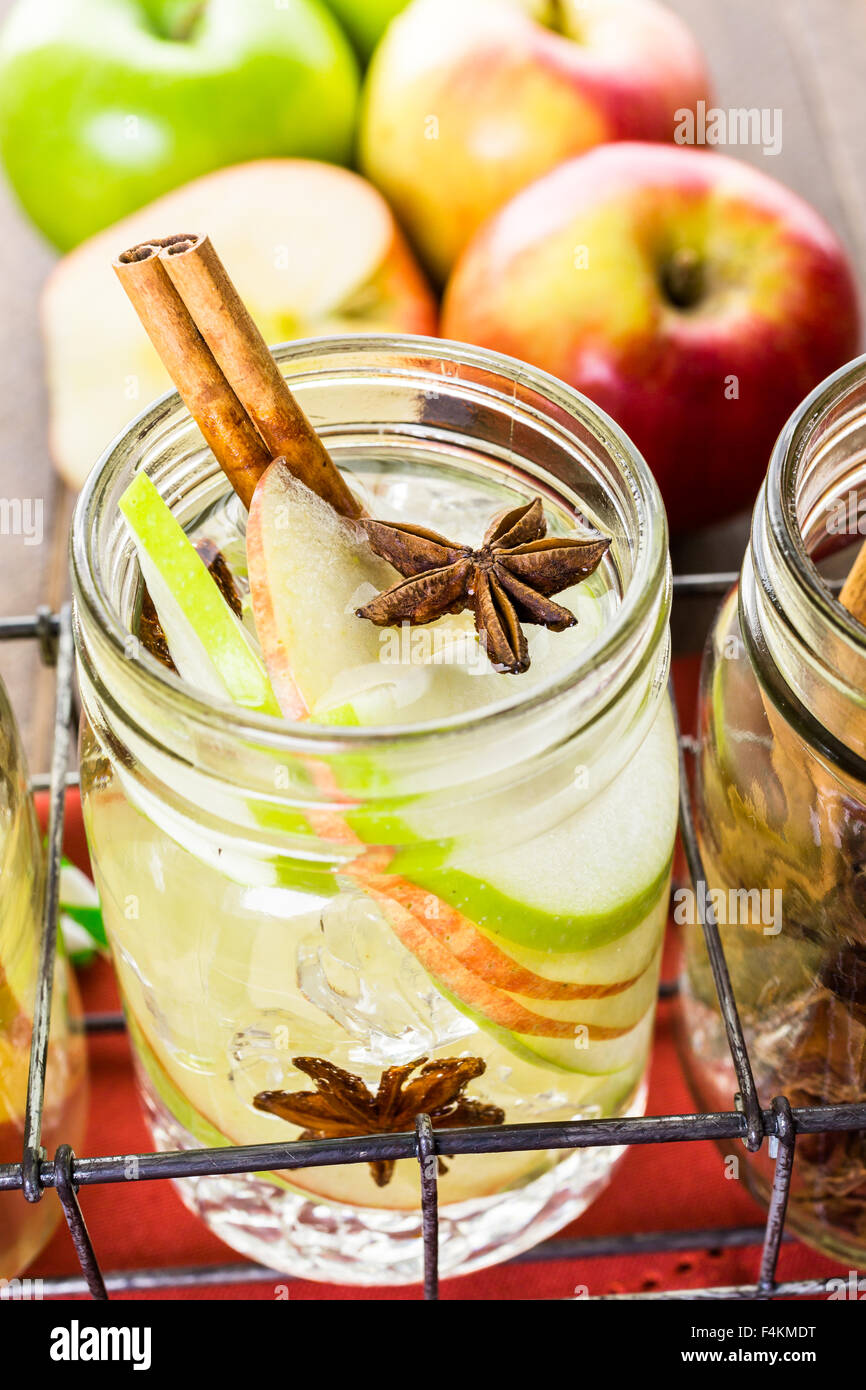 Infused apple water with cinnamon and anise Stock Photo - Alamy