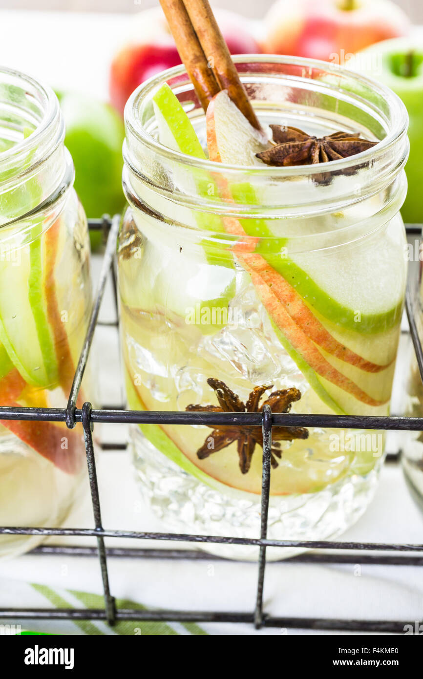 Infused apple water with cinnamon and anise Stock Photo - Alamy