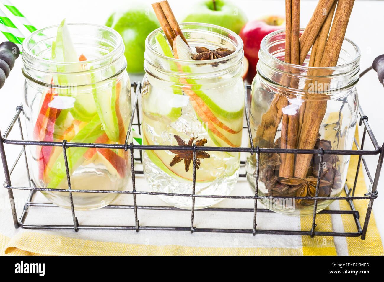 Infused apple water with cinnamon and anise Stock Photo - Alamy