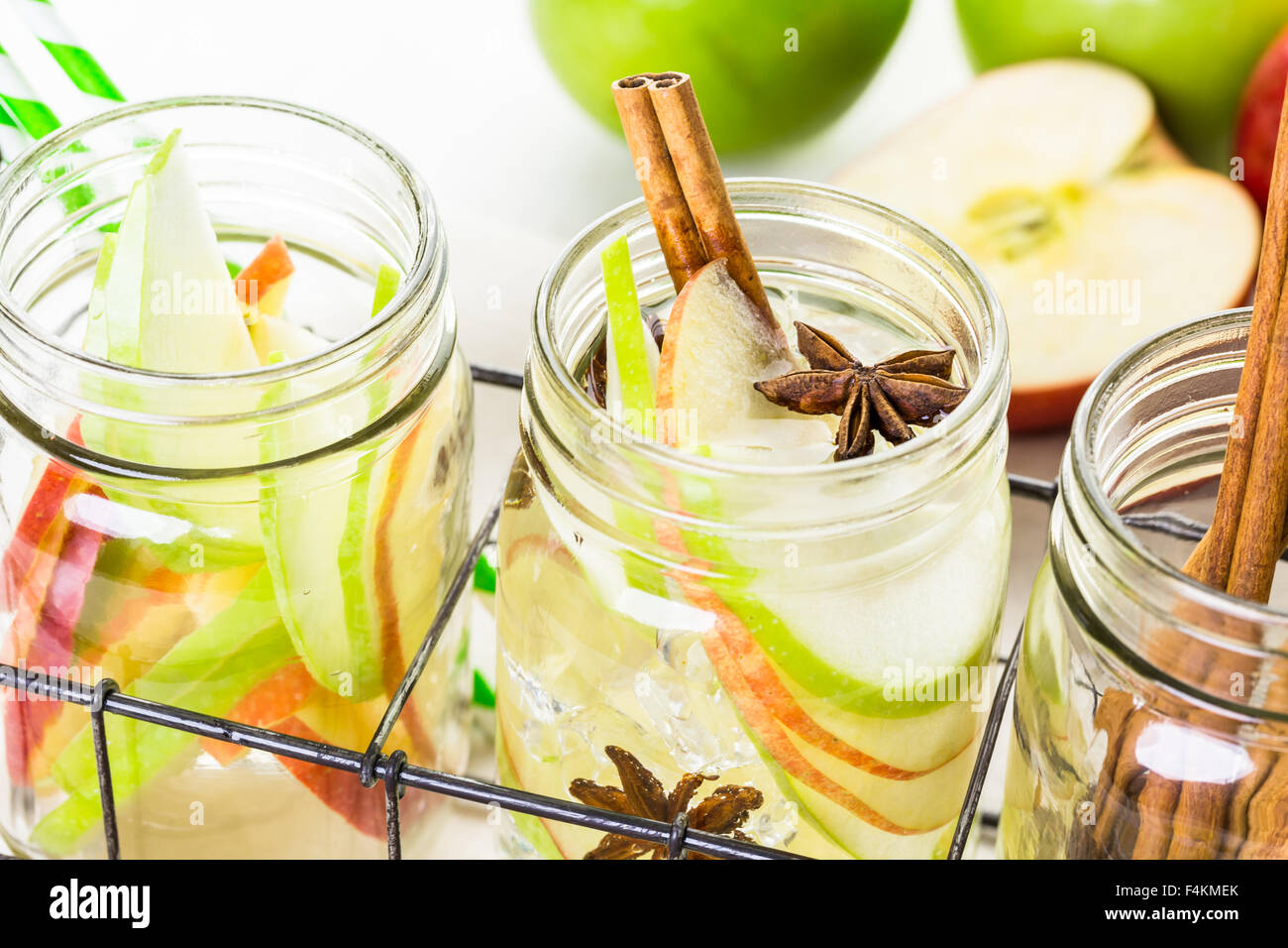 Infused apple water with cinnamon and anise Stock Photo - Alamy