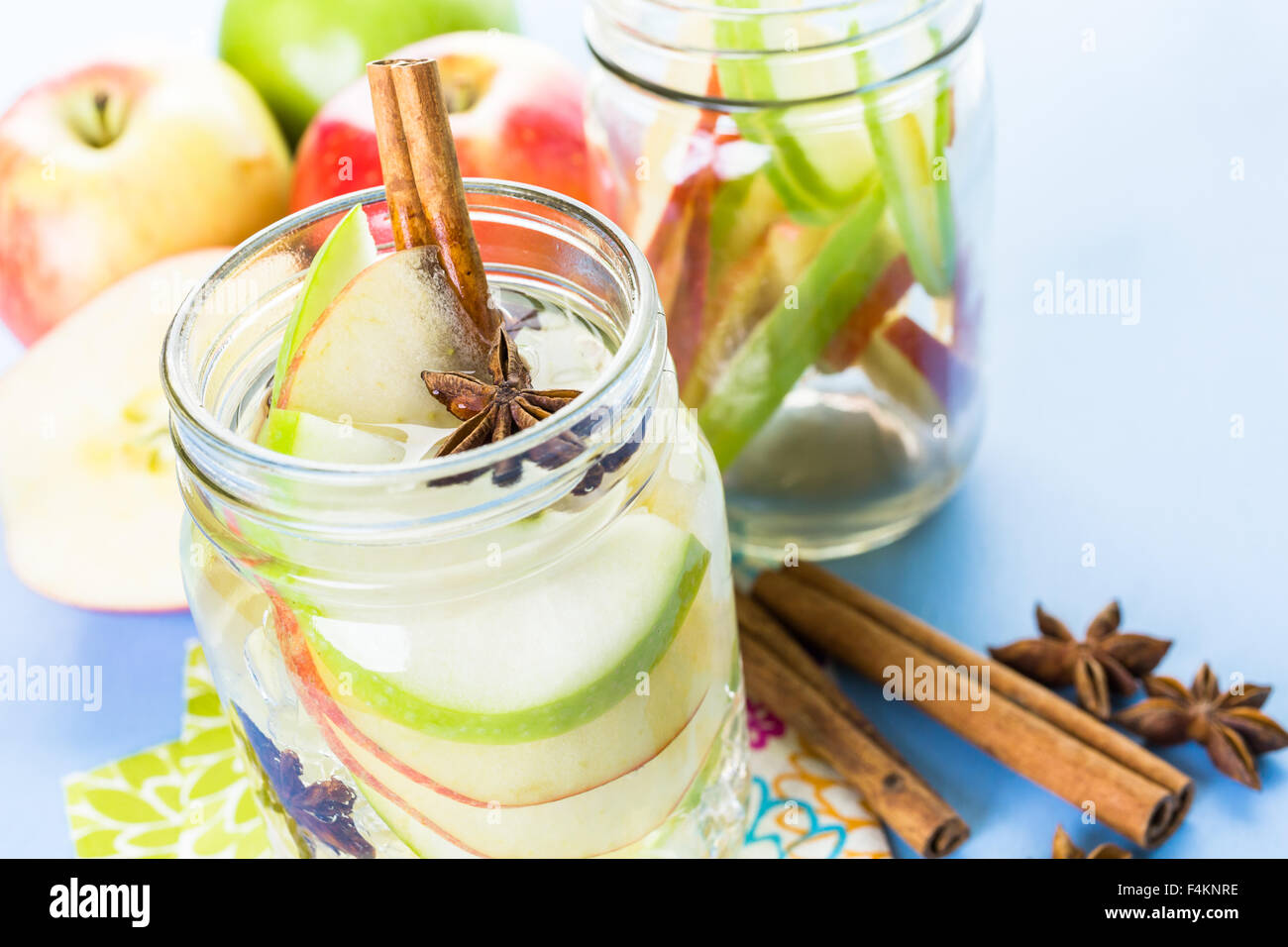 Infused apple water with cinnamon and anise Stock Photo - Alamy