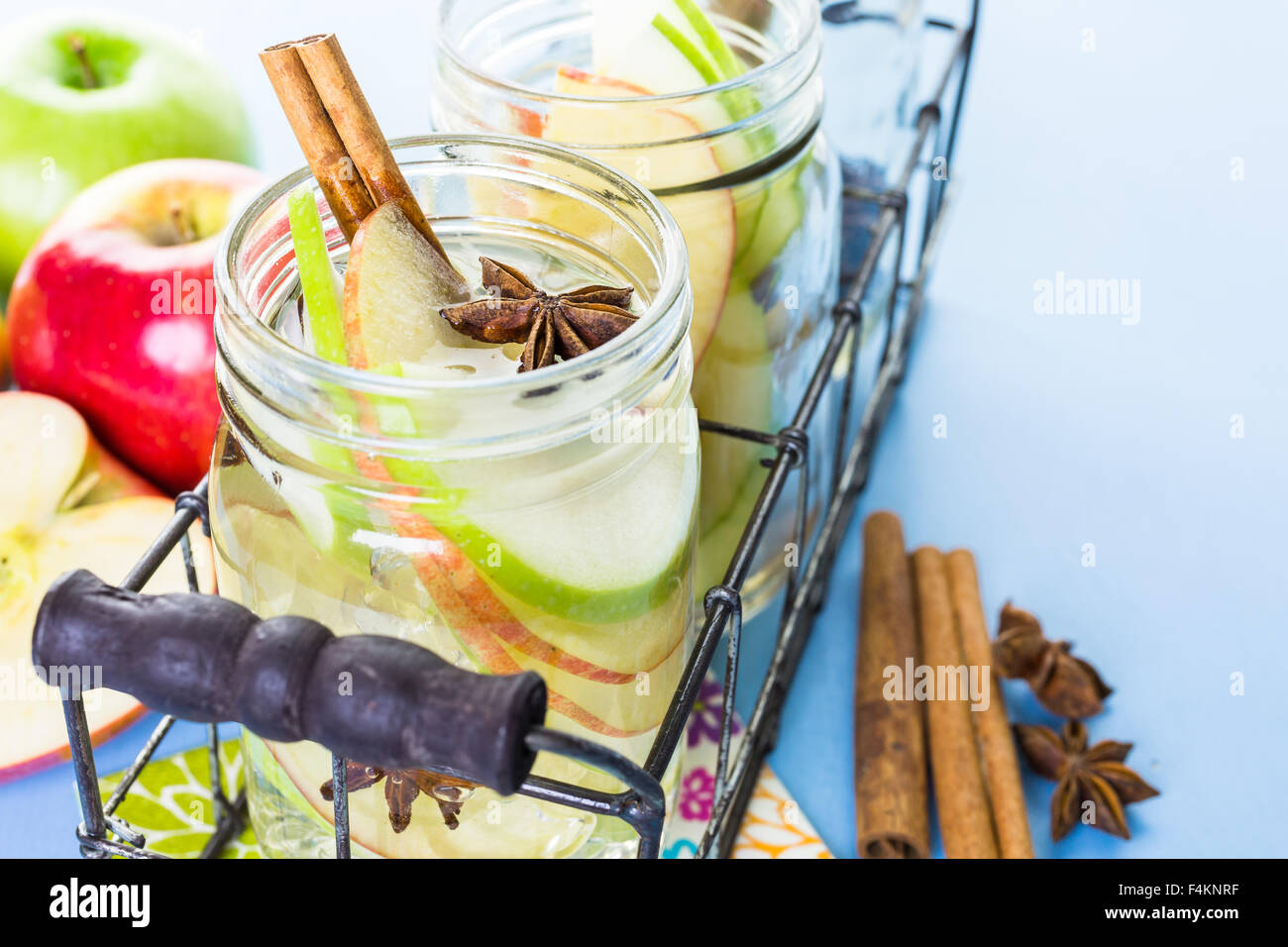 Infused apple water with cinnamon and anise Stock Photo - Alamy