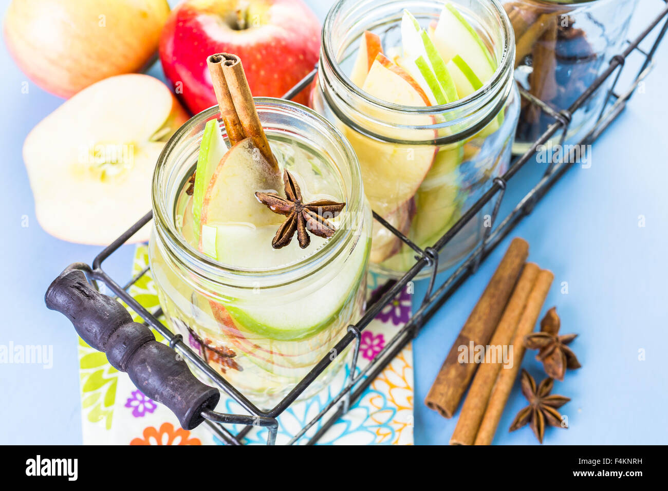 Infused apple water with cinnamon and anise Stock Photo - Alamy