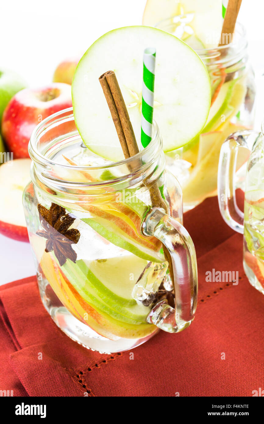 Infused apple water with cinnamon and anise Stock Photo - Alamy