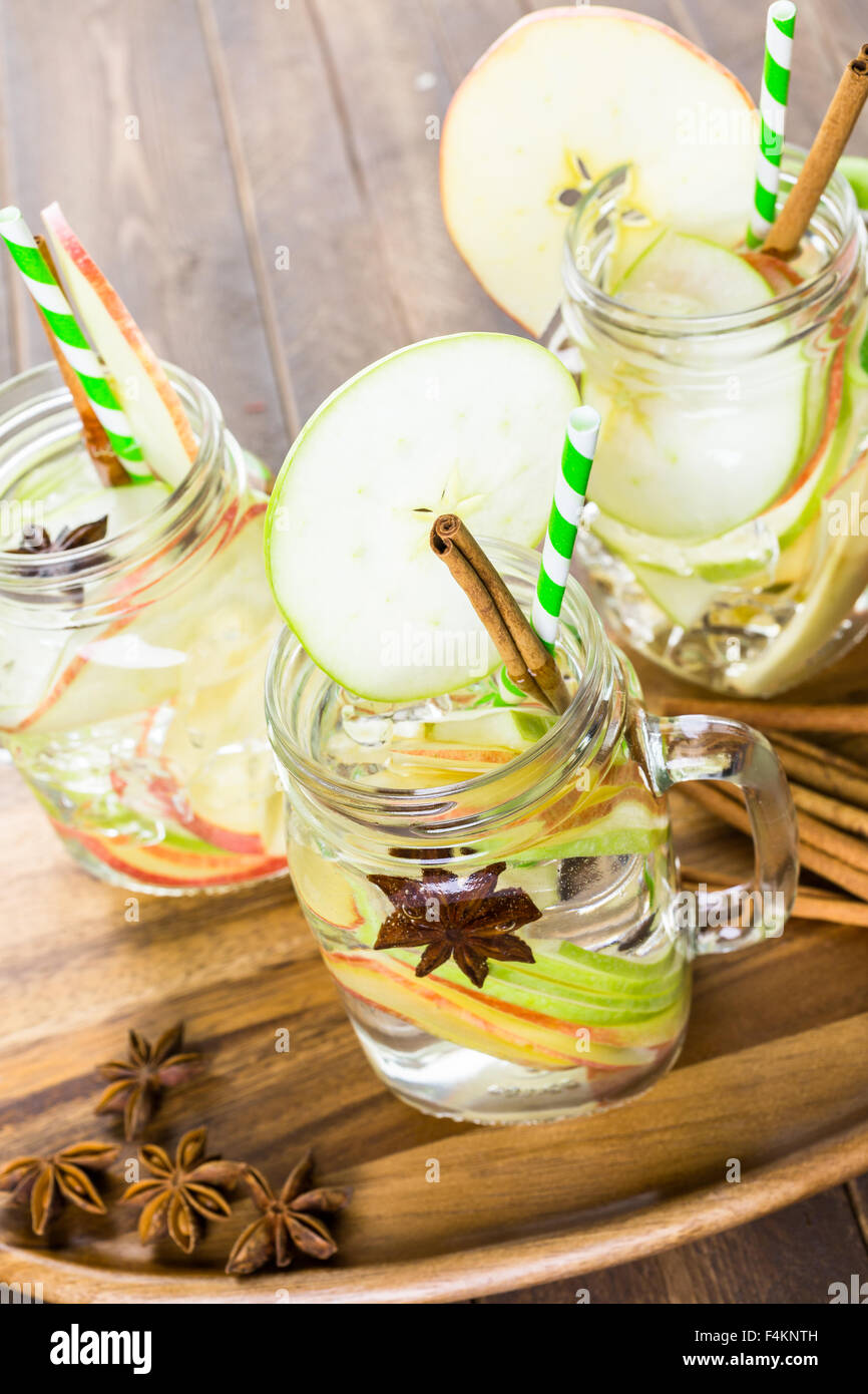 Infused apple water with cinnamon and anise Stock Photo - Alamy