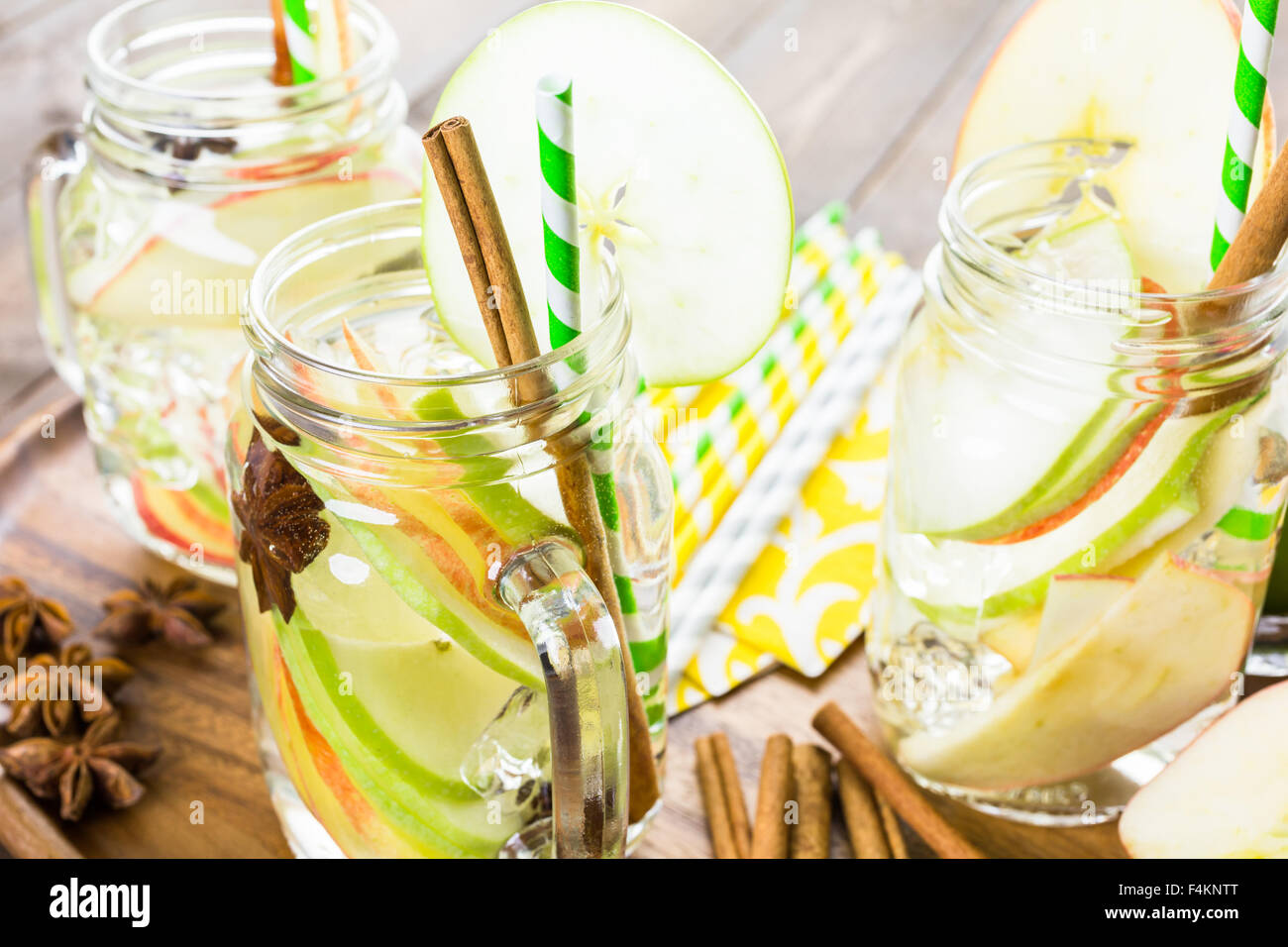 Infused apple water with cinnamon and anise Stock Photo - Alamy