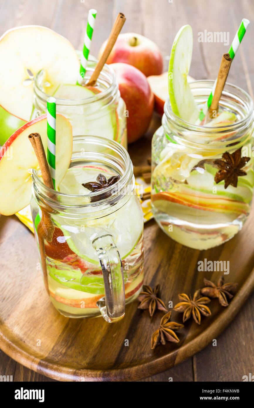 Infused apple water with cinnamon and anise Stock Photo - Alamy