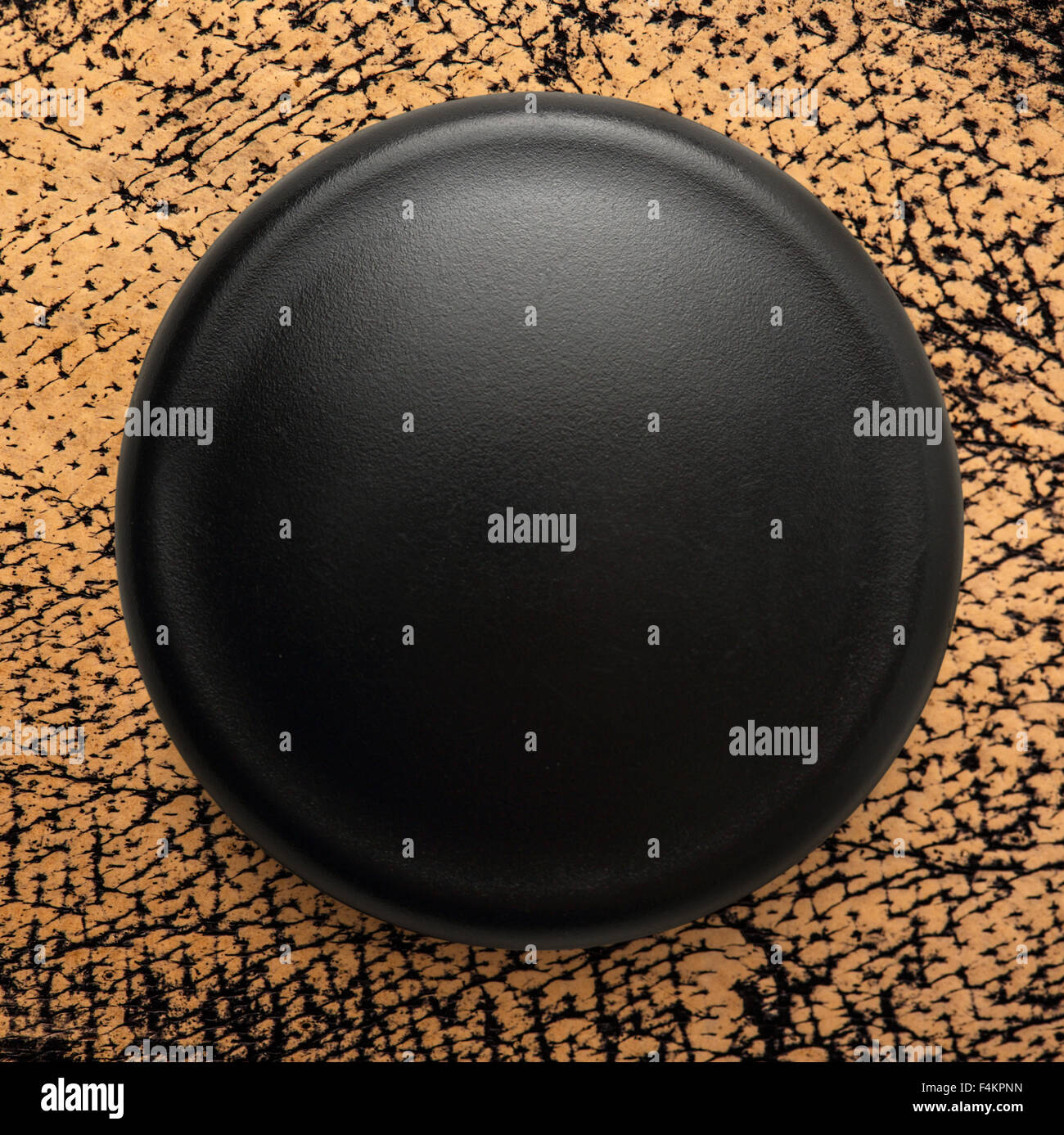 Blank black button as background in closeup Stock Photo - Alamy