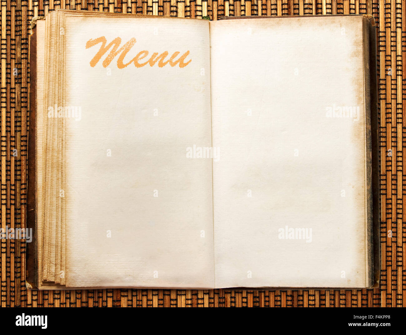 One open blank vintage menu book closeup Stock Photo - Alamy