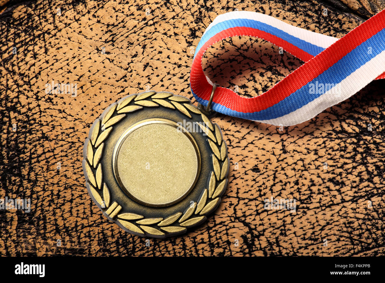 Metal medal with tricolor ribbon in closeup Stock Photo - Alamy