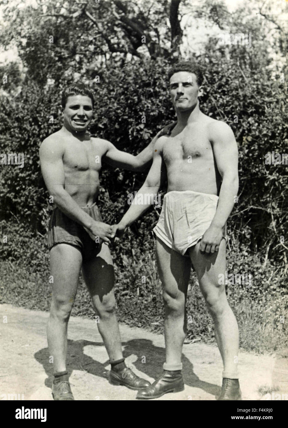Two friends boxers shaking hands, Italy Stock Photo - Alamy