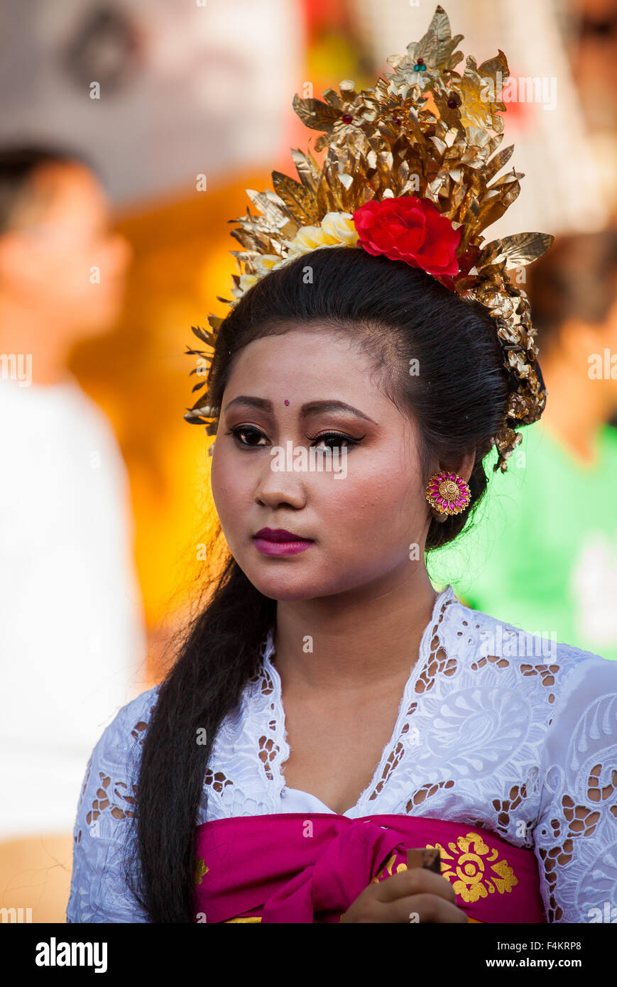 Beautiful young Balinese woman in traditional attire Stock Photo - Alamy