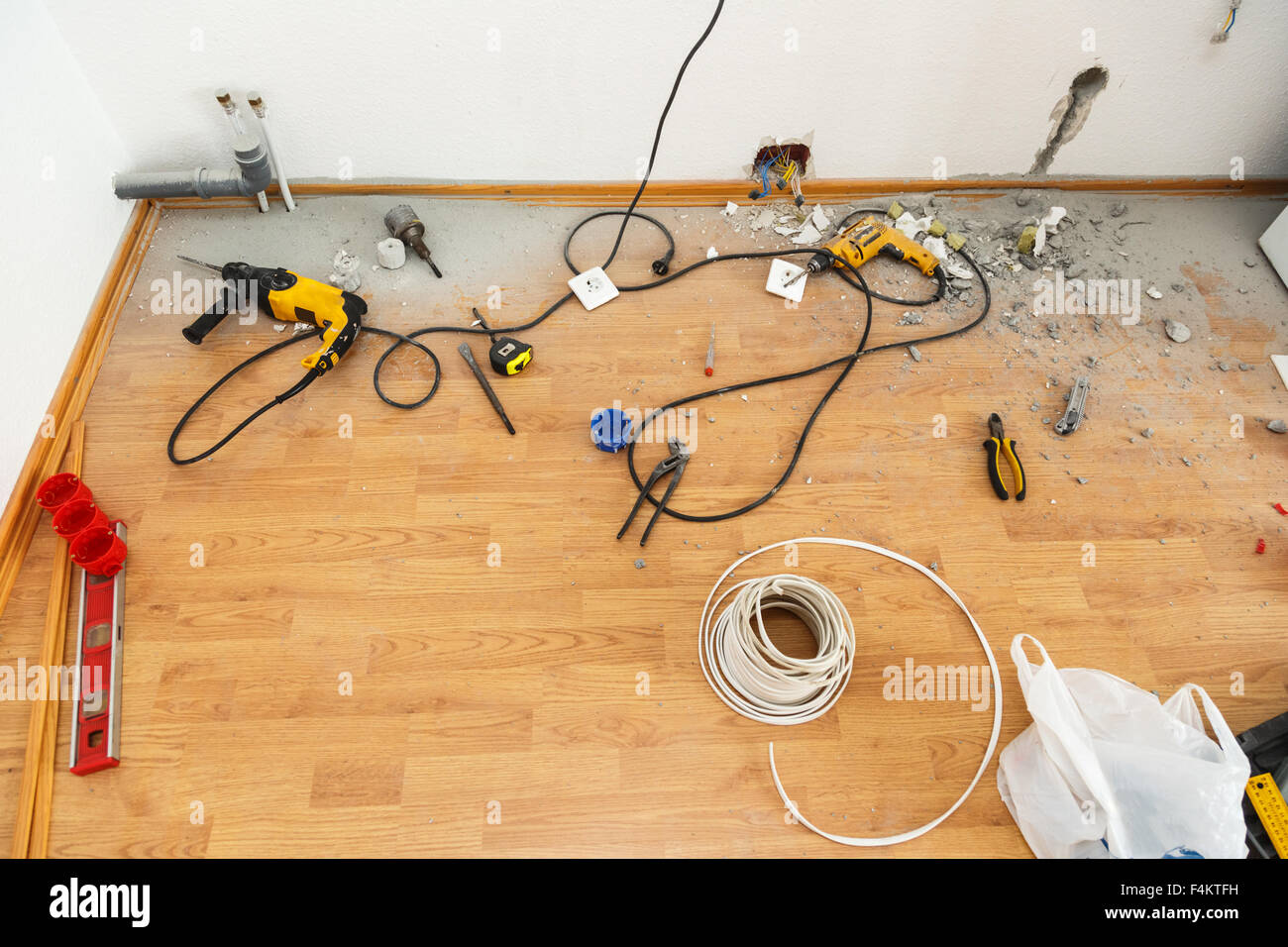 Place of electric socket repair process with drill Stock Photo - Alamy